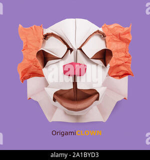 Origami paper clown face isolated on white Stock Photo - Alamy