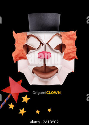 Origami paper clown face isolated on white Stock Photo - Alamy