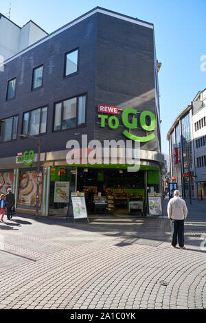 REWE City logo at the entrance of a REWE supermarket in Cologne Stock ...