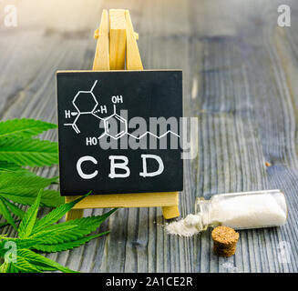 CBD Cannabidiol crystals isolate, cannabis resin and flower bud with ...