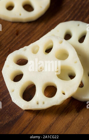 Raw Organic White Lotus Root in Slices Stock Photo - Alamy