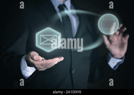 Business man with glowing media icons exploding head Stock Photo - Alamy
