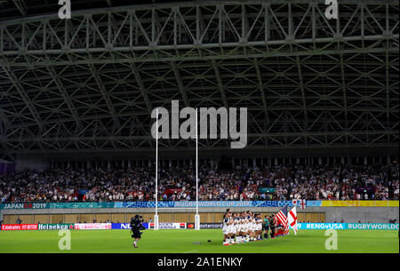 Japan players line up ahead of a World Cup Group F football match ...