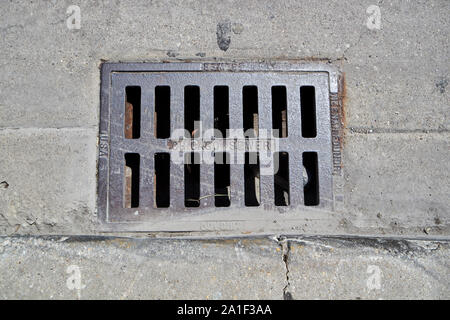 Cast iron storm drain grate Stock Photo - Alamy