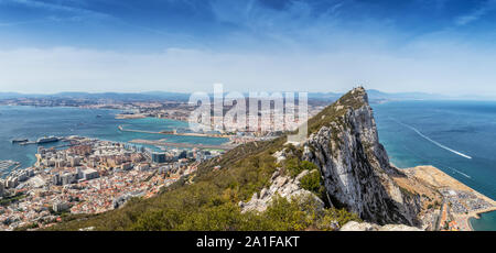 Aerial view of Gibraltar harbor with cruise ship and cargo ships ...