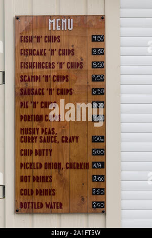Take away food and meal menu on display in a takeaway noodle bar ...