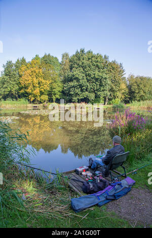 Angler at Stanners Pool along the Sankey Valley Trail at Winwick Quay ...