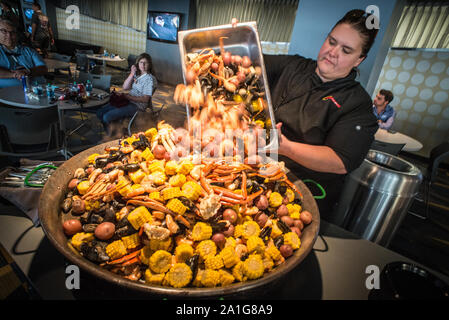 Large pot serving of seafood clam bake Stock Photo - Alamy