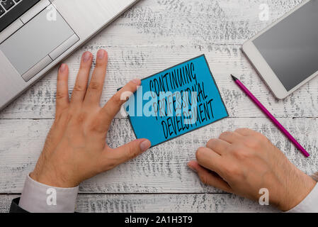 Conceptual hand writing showing Continuing Professional Development ...