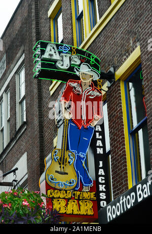 A neon sign over the entrance to AJ's Good Time Bar, owned by singer ...