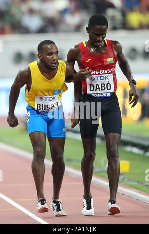 Braima SUNCAR DABO r. (Guinea-Bissau) helps Jonathan BUSBY (Aruba ...