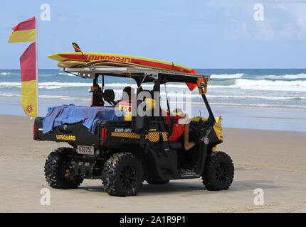 Australia, lifeguard with quad on the beach of Noosa Stock Photo - Alamy