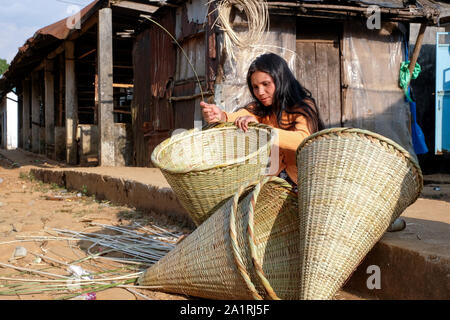 Woman is weaving basket of bamboo. Village Khrang, Khasi-Hills, state ...