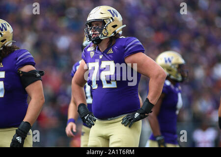 Washington offensive lineman Trey Adams speaks during a press ...