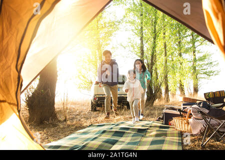 A happy family in the outdoor outing Stock Photo - Alamy