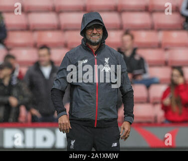 Jurgen Klopp manager of Liverpool wraps up warm during the Premier ...