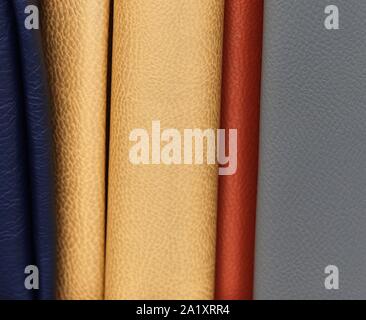 Colorful detailed fabric textures of different cloth types in a close ...