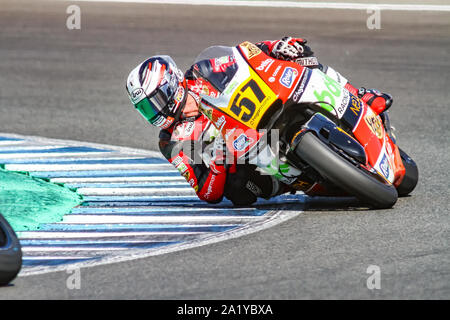Moto2 riders, winner Edgar Pons # 57, Alessandro Zaccone # 61 on race ...