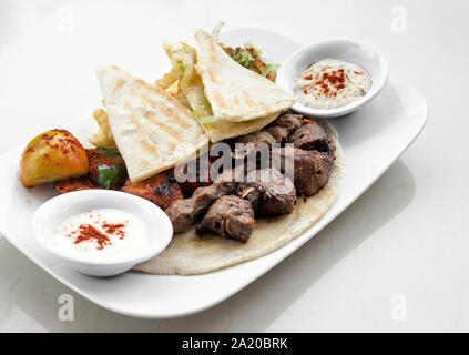 lebanese meshwi mixed bbq grilled meat set with chicken, lamb and beef ...