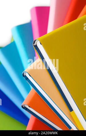 Spiral stack of rainbow colored books Stock Photo - Alamy