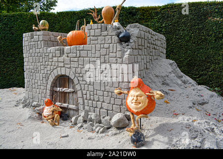 Human pumpkins in a castle in fight Stock Photo - Alamy