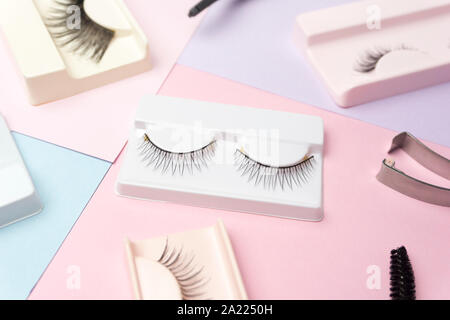 false eye lashes on white background Stock Photo - Alamy