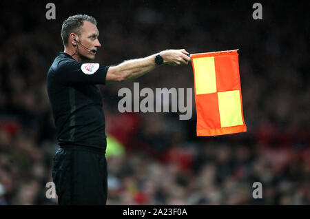 The linesman flags for offside Stock Photo - Alamy