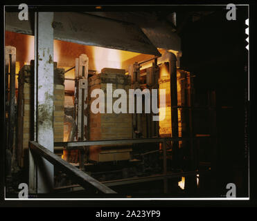 A side view of a glass furnace at Owens-Corning Fiberglas Corporation ...