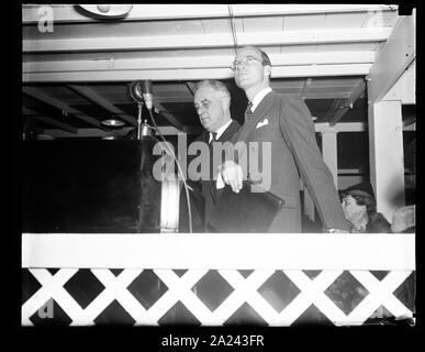 A photograph of Franklin D. Roosevelt, his son James Roosevelt, and his mother Sara Delano ...