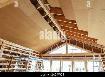 Interior of roof showing support structure, cross beams and light ...