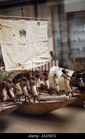 Ancient Egyptian model of a funerary boat with oarsman and a sarcopagus ...