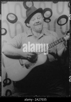 A portrait of Burl Ives, an American folk singer, actor, and voice ...