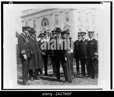 President Coolidge decorating Henry Breault of the submarine 0-5 with ...