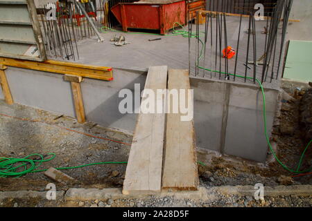 Makeshift transition through wooden boards over a pit Stock Photo - Alamy