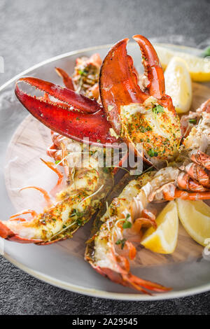 Delicious grilled lobster in a white plate in restaurant Stock Photo ...