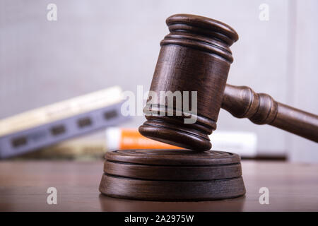 Corruption concept as a justice judge gavel or mallet coming down on ...