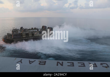 LCAC 30 departs well deck 141002 Stock Photo - Alamy