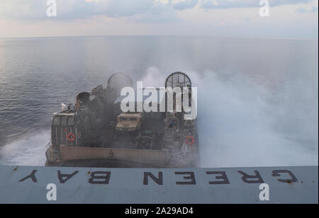 LCAC 30 departs well deck 141002 Stock Photo - Alamy