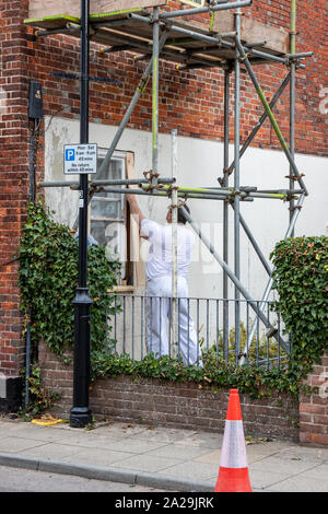 Scaffold Scaffolding Painting and decorating on small modern house ...