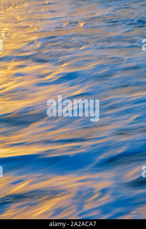 Sparkling fluid. Liquid shimmer flow. Blur purple color shiny ...