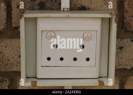 South African Electric Double Wall Plug with Adapter Stock Photo - Alamy