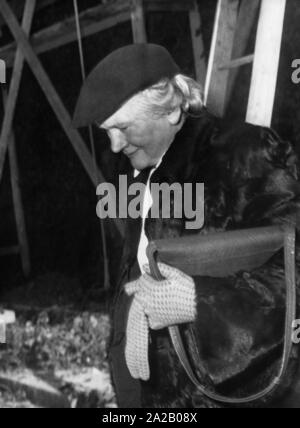 Paula Hitler, Adolf Hitler's sister, has a her photograph taken while ...