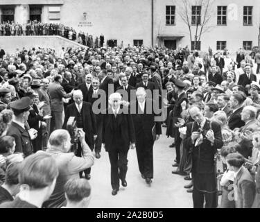 German President Theodor Heuss, left, hands the letter of appointment ...