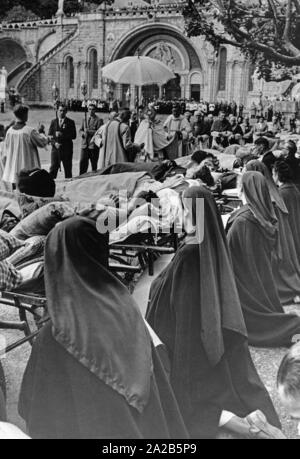 1960s, historical, a catholic priest in a Renaissance embroidered ...
