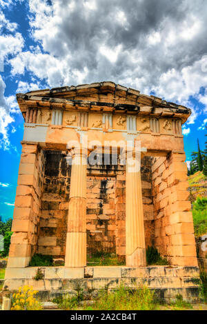 Building of Treasury of Athens in Ancient Greek archaeological site of ...