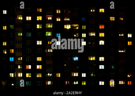 flat night panorama of multicolor light in windows of multistory ...