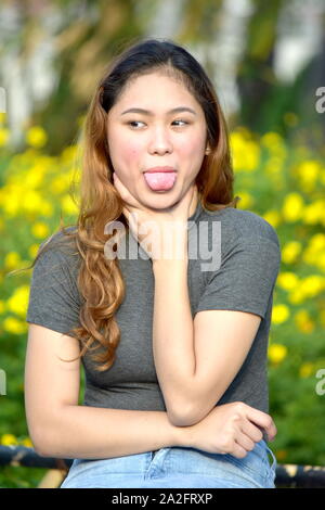 A Youthful Diverse Female Choking Stock Photo - Alamy