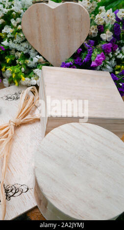 Colorful gift boxes with flowers on sky blue background. flat lay, top ...