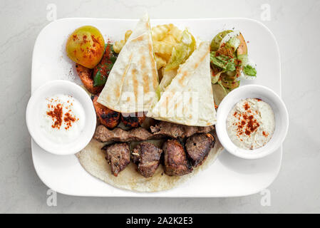 lebanese meshwi mixed bbq grilled meat set with chicken, lamb and beef ...