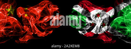 China, Chinese vs Burundi, Burundian smoky mystic states flags placed ...